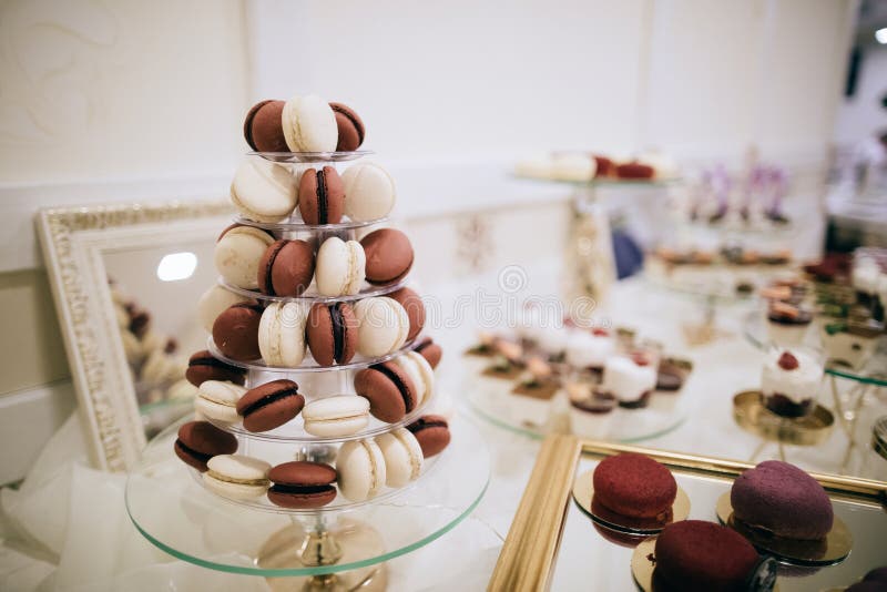Dessert Table at the Wedding Reception with Red and White Macaroons Stock Photo - Image of ...