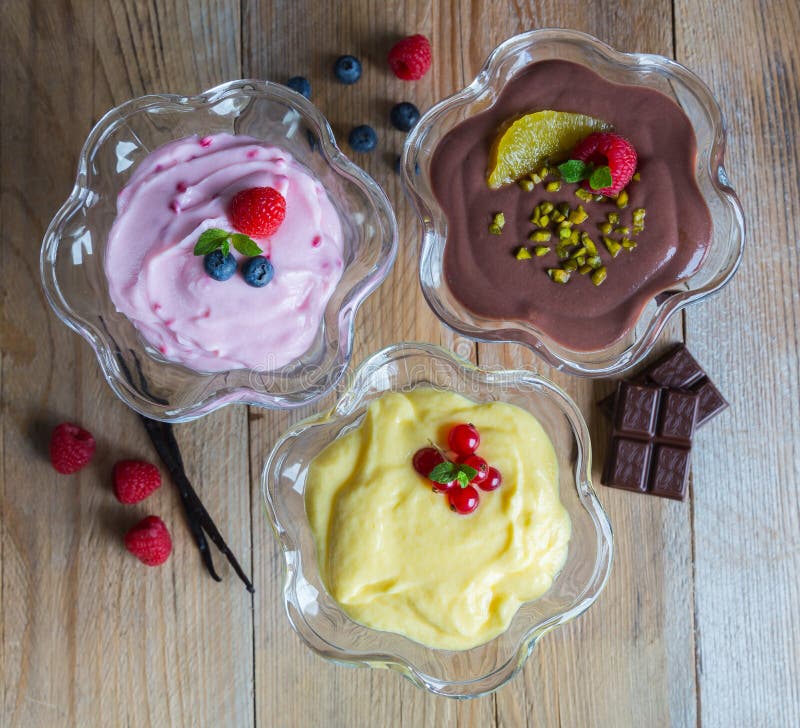 Dessert variation chocolate cream raspberry cream vanilla cream - Stock ...