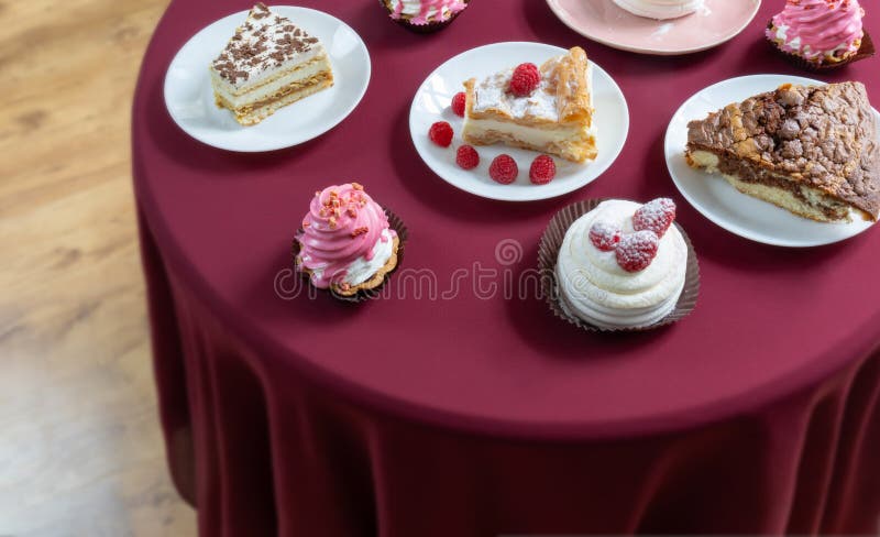 Desserts with Raspberries on White Plates on the Table Stock Image ...