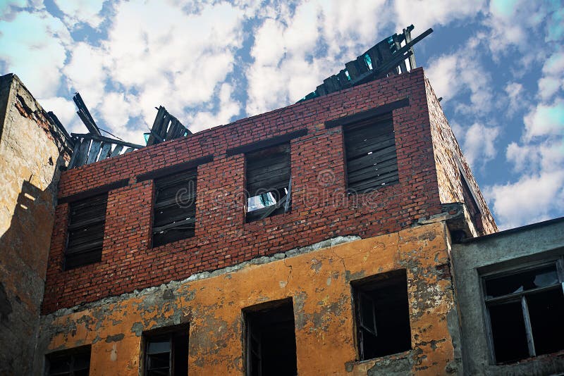 Abandoned Brick Building after Fire Under a Cloudy Sky Stock Image ...