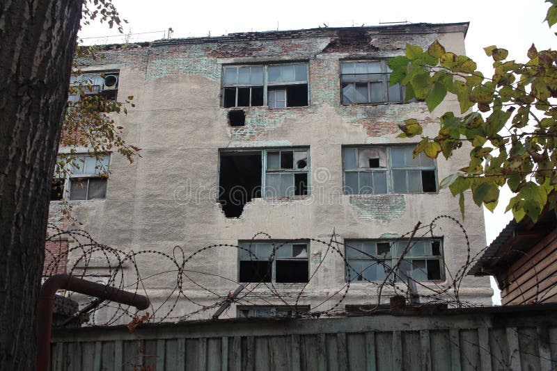 Destroyed Abandoned Building Broken Windows with Broken Glass on the ...