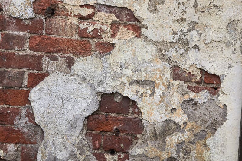 Destroyed Brick Wall with Fallen Off Plaster Stock Photo - Image of ...