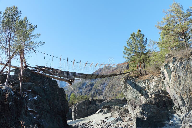 The Destroyed Bridge among Mountains Stock Photo - Image of pendulous ...
