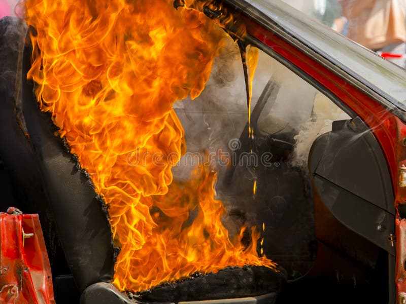 Destroyed Car on Fire in a Fire Service Show Stock Photo - Image of ...