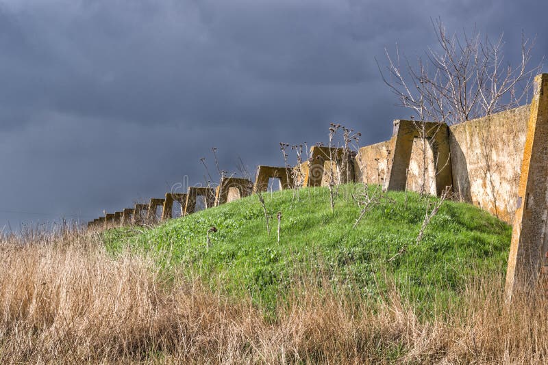 Destroyed Concrete Structure of an Old Abandoned Farm on a Background ...