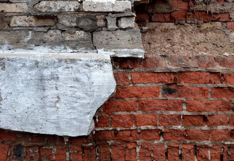 Destroyed Gray Plaster on a Red Brick Wall. Background Stock Photo ...