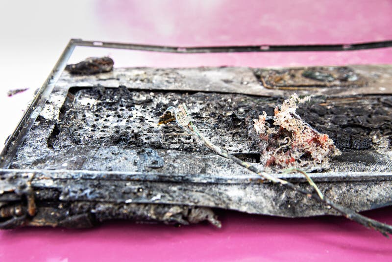 Broken Laptop Computer Spoiled by Flame Melted Plastic. Computer Damage ...