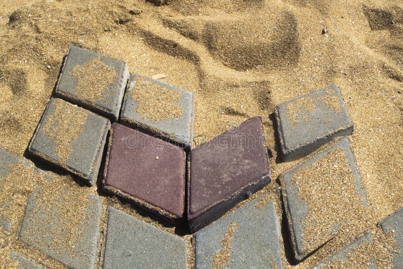 Destroyed Path of Paving Stone on a Sandy Base Stock Photo - Image of ...