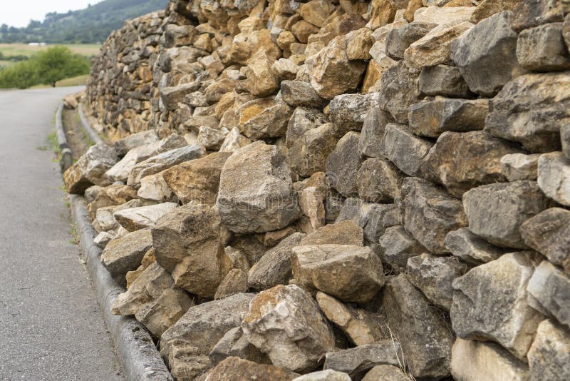 Destroyed Retaining Stone Wall of Natural Stone after Heavy Rains Stock ...