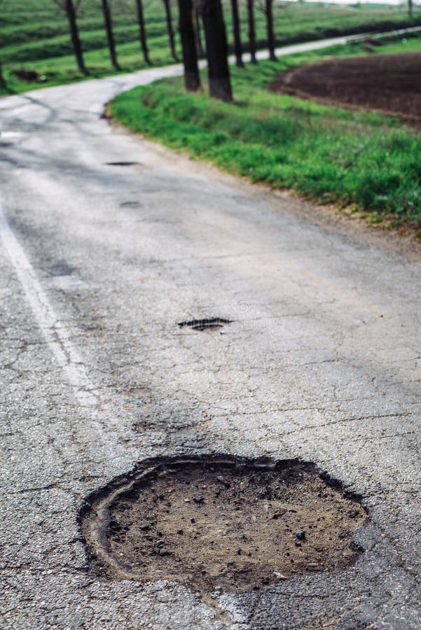 Destroyed Road in Countryside Stock Image - Image of hills, broken ...