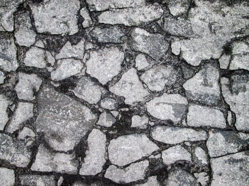 Destroyed stone road. stock photo. Image of buried, brick - 209933236