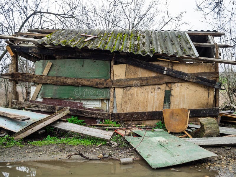 The Destroyed Wooden Constructions. the Deserted and Plundered House ...