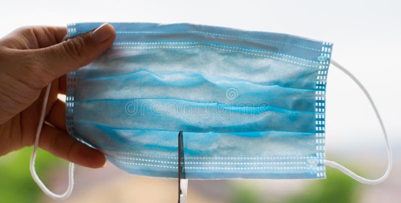 Destruction of a Medical Mask. End of Quarantine Stock Image - Image of ...