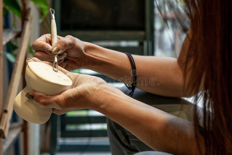 Detail of an Artisan Hands Polishing a Ceramic Vase - 3 Stock Image ...