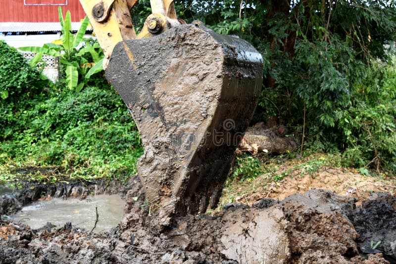 Backhoe dig ground stock image. Image of environment - 135523893