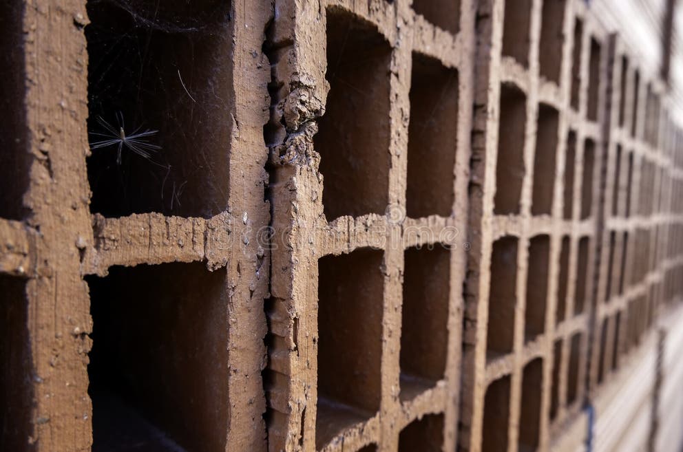 Bricks with holes stock photo. Image of object, void - 305002582