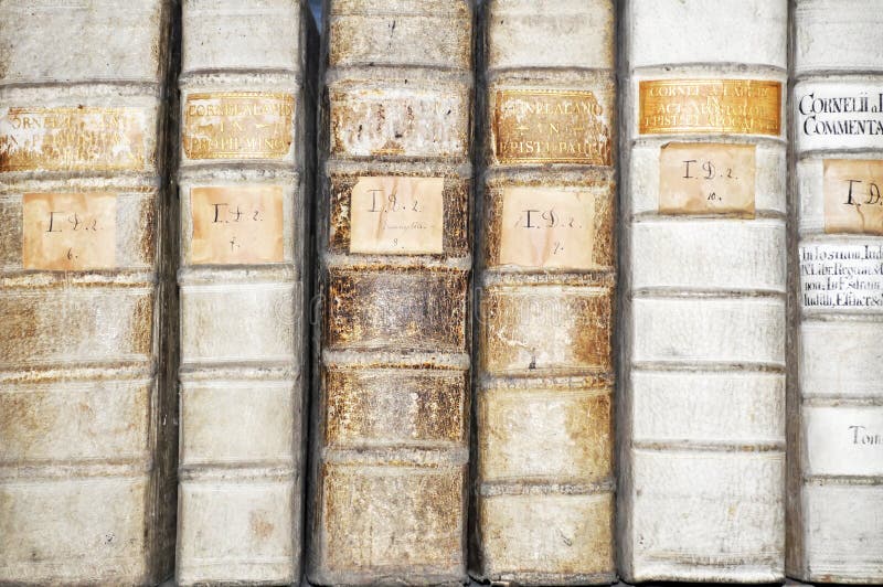 Old Leather Bound Books Spines on Library Shelf Stock Photo - Image of ...
