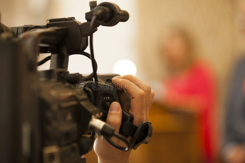 Detail of camera man hand. stock image. Image of recording - 46381203
