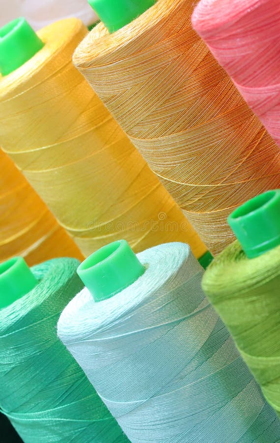 A Spool of Thread and a Needle with a Thread Stock Photo - Image of ...