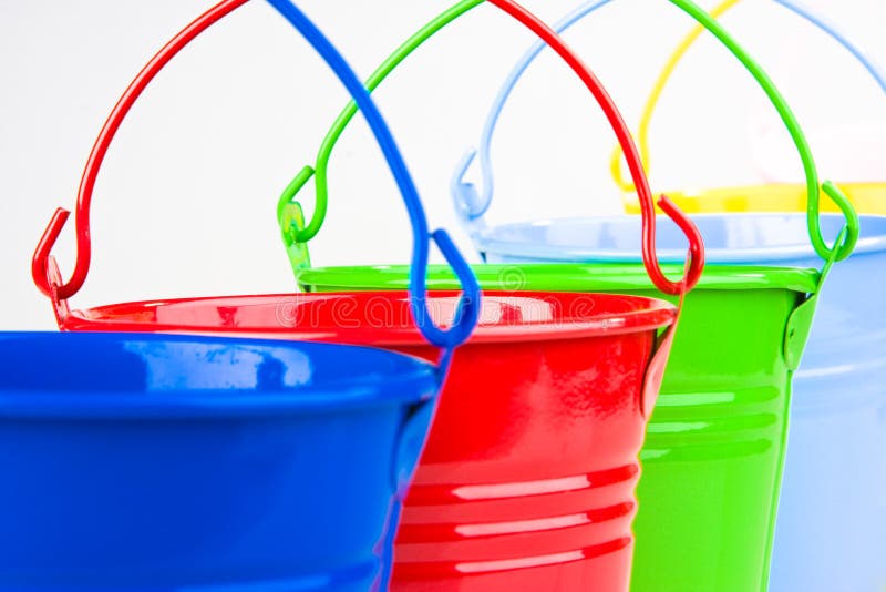 Coloured Buckets on the Floor Stock Photo - Image of trash, green: 8105718