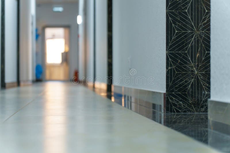 The Detail of the Corner Baseboard on the Wall and Granite Tiles on the ...