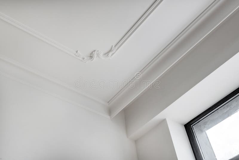 Detail of Corner Ceiling Cornice with Intricate Crown Molding Stock ...