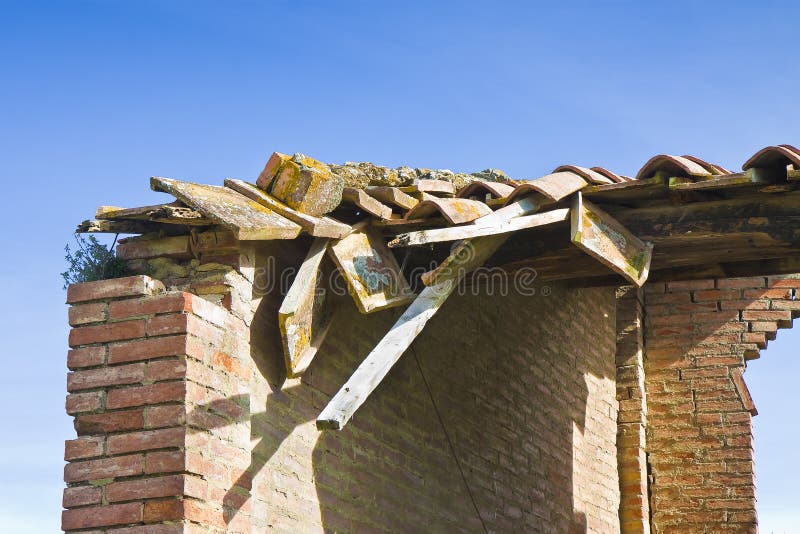 Destroyed Roof and Broken Windows in a Large Burned Out Old Industrial ...