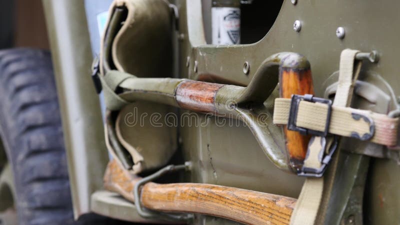 Detail of Different Work Tools on the Side of Military Vehicle. Shovel ...