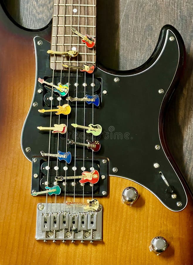 Detail of an Electric Guitar Decorated with Guitar Pins, Simulating the ...