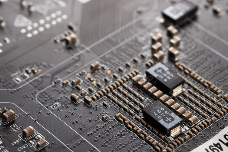 Detail of Electronic Components and Microchips on a Video Card. Latest ...