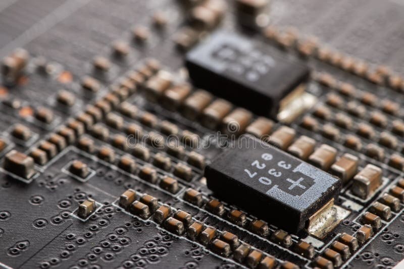 Detail of Electronic Components and Microchips on a Video Card. Latest ...