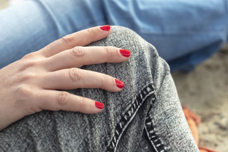 Detail of a Female Hand Resting on Her Partner`s Leg Stock Photo ...