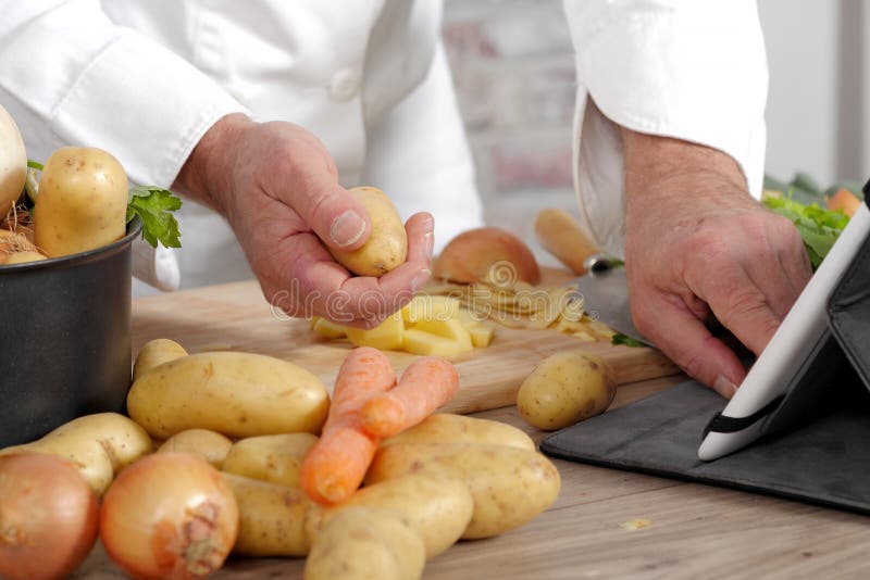 Detail of Hands of Chef Using Tablet for Cooking Stock Image - Image of ...