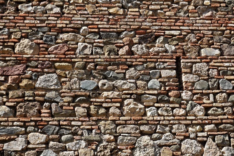 Detail of a Horizontal Stony Wall Made of Thin and Thick Rows of Bricks ...