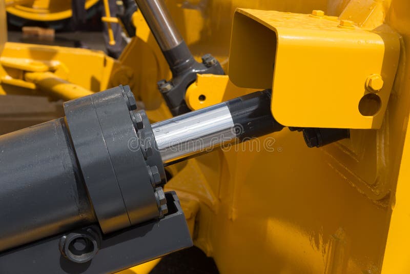 Detail of Hydraulic Bulldozer Piston Stock Photo - Image of yellow ...