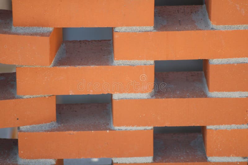 Detail of Interlocking Orange Bricks Arranged in a Structured Pattern ...