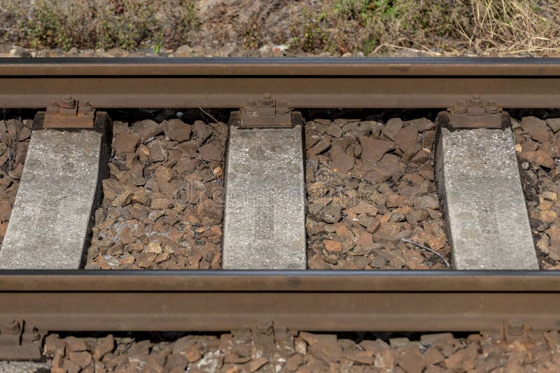 Detail Iron Rails of the Train between Rocks Stock Image - Image of ...