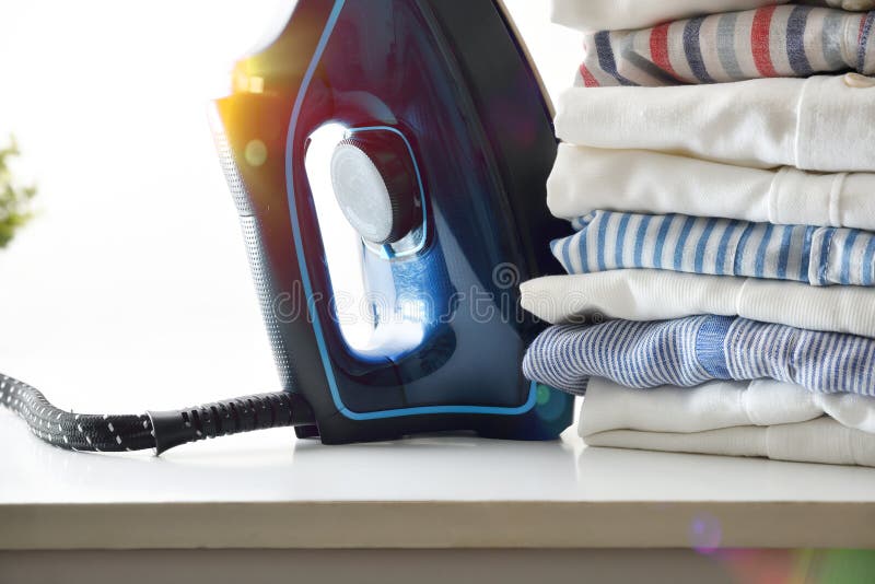 Detail of Ironing with Iron and Ironed Shirts Stock Image - Image of ...