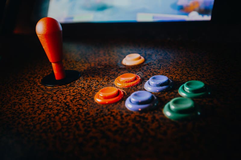 Detail on a Joystick and Button Controls of a Vintage Arcade Video Game ...