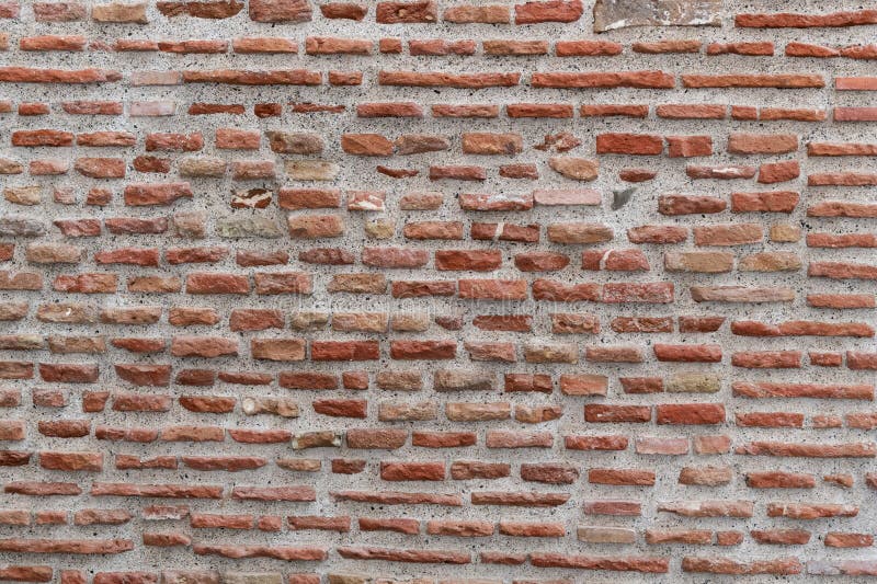 Detail of a Large Section of a Red, Brick Wall Worn Down by Time Stock ...