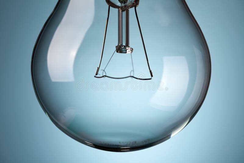 Detail of Light Bulb on Blue Background Stock Photo - Image of ...