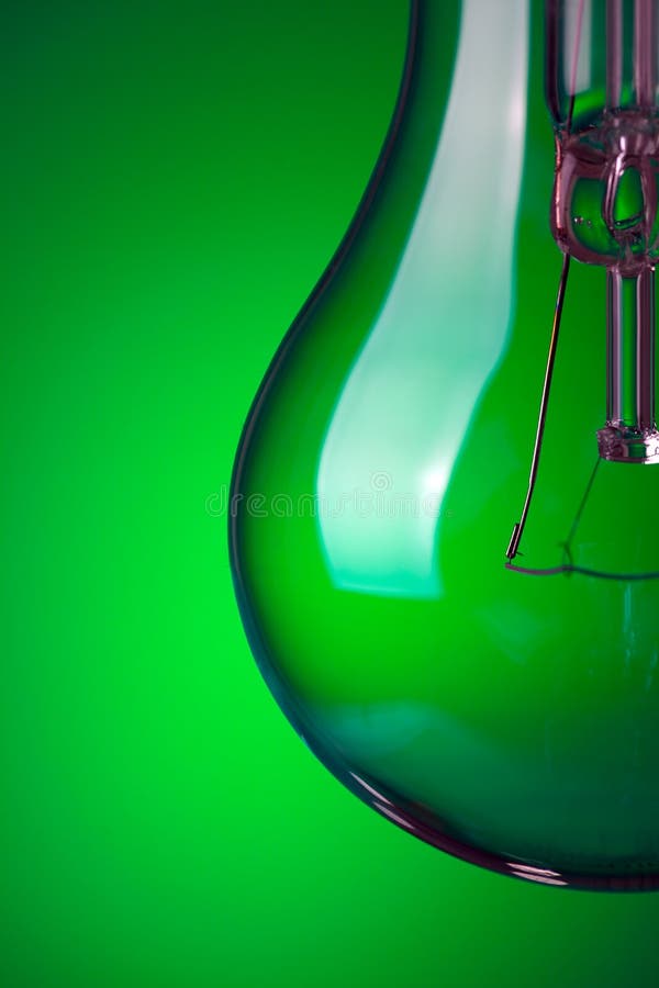 Detail of Light Bulb on Green Background Stock Photo - Image of edison ...