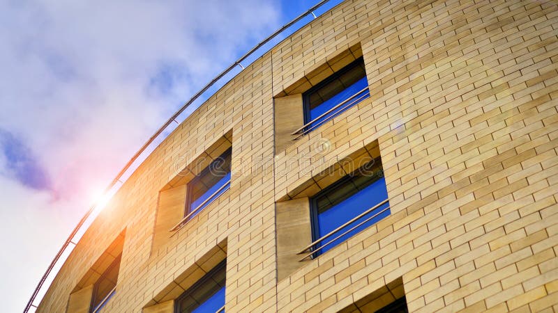 Detail of a Modern Yellow Brick Building with Large Windows. Stock ...