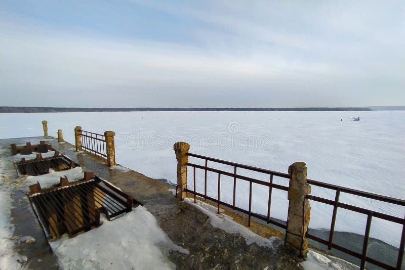 Detail of an Old Abandoned Bridge with Broken Railing Over a Frozen ...