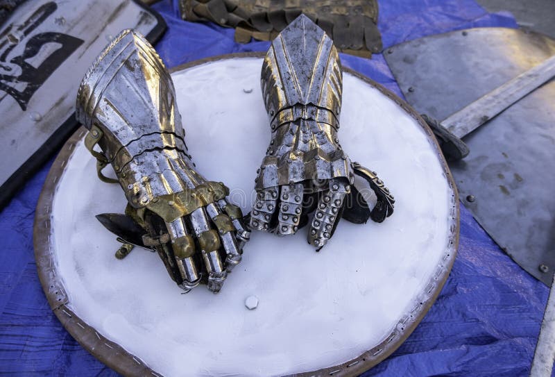 Medieval metallic gloves stock image. Image of antique - 268694441