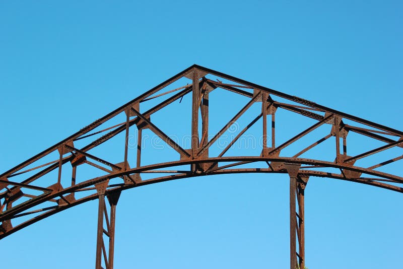 Detail of Old Rusty Metal Bridge Against Blue Sky Background Stock ...