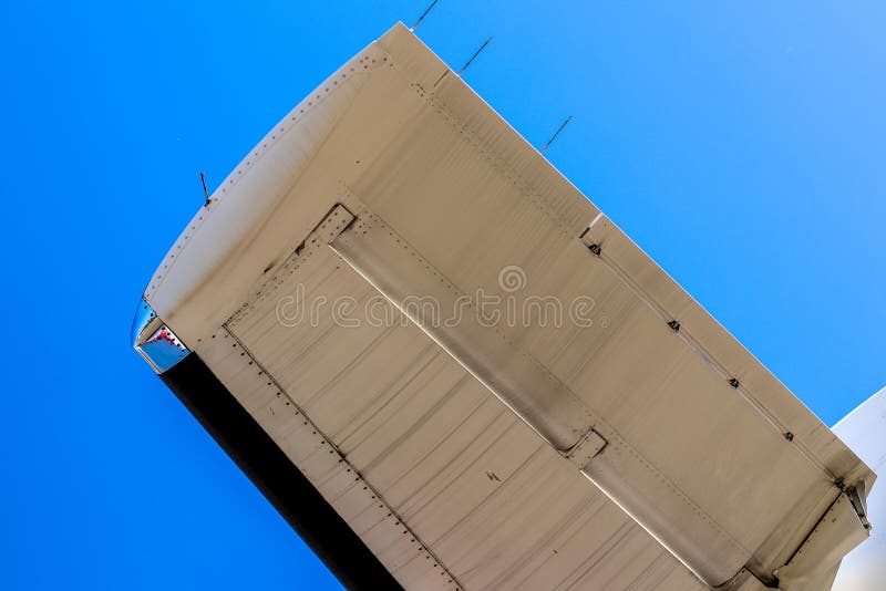 Detail of One of the Rear Wing of the Aircraft with Blue Sky in ...