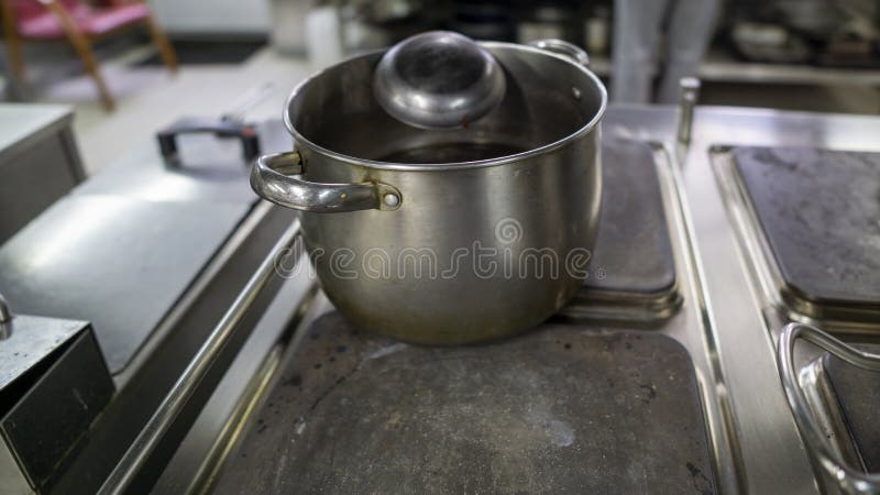 Detail of pan in a kitchen stock image. Image of kitchen - 233803831