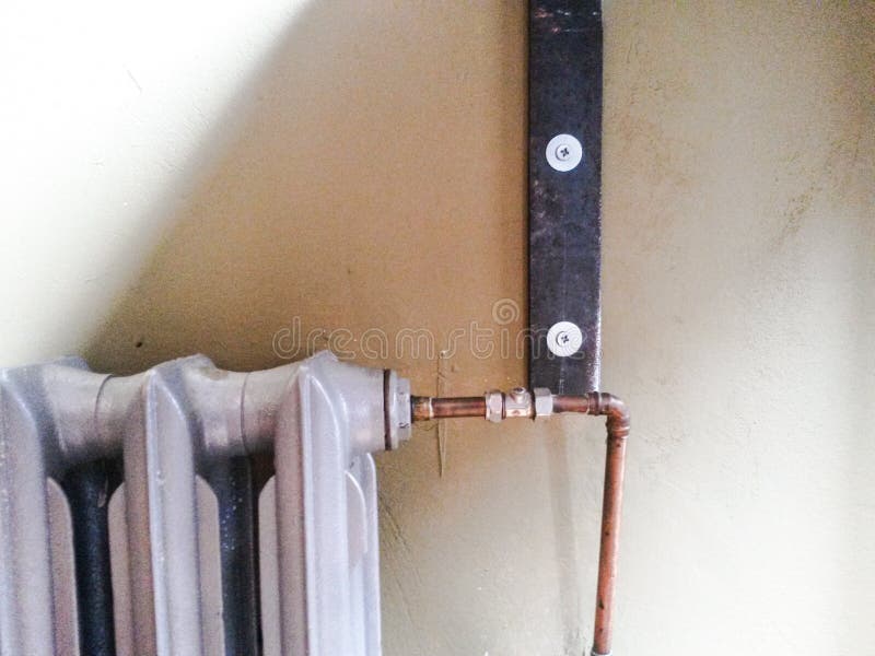 Detail of Radiator and Pipe Stock Photo - Image of bracket, shadow ...