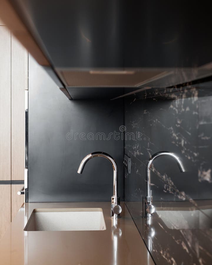 Detail of a Rectangular Designer Kitchen Sink with Chrome Water Tap ...